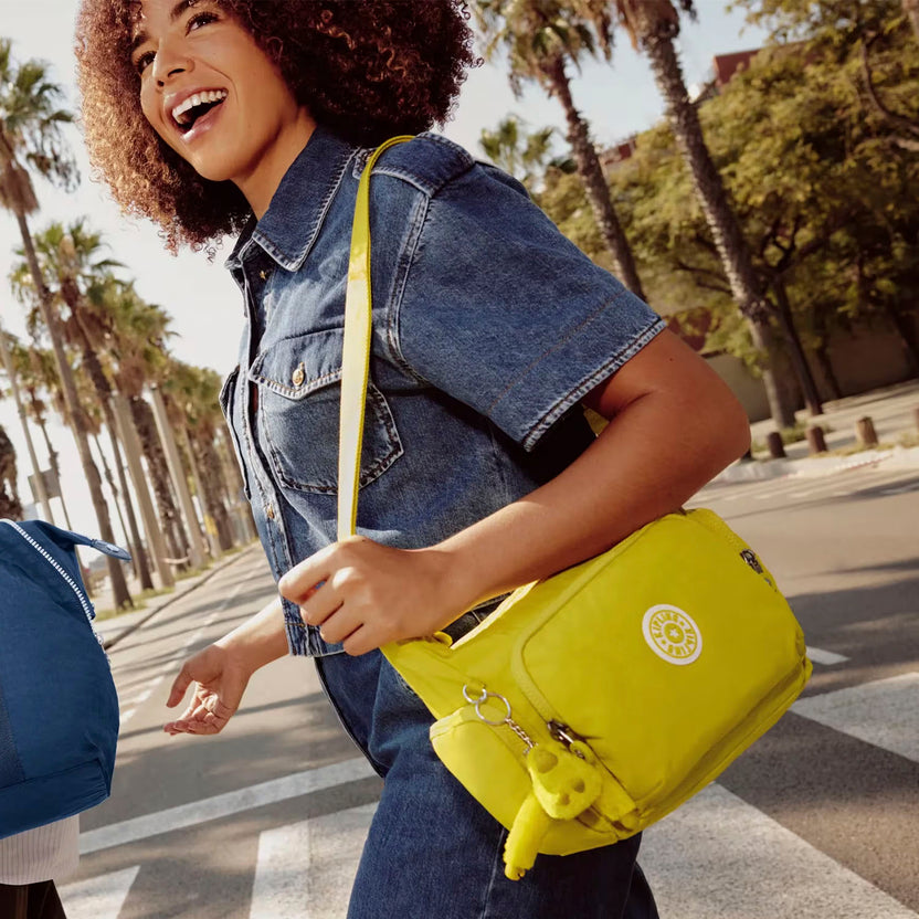 Kipling Live. A colorful array of handbags, backpacks and much more